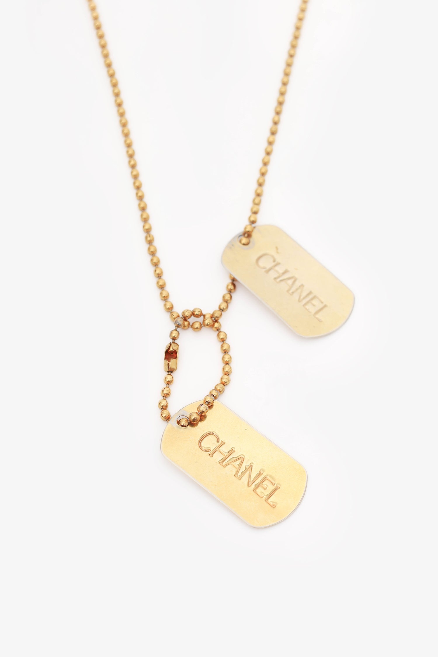 Pre-Loved Chanel™ 93A Gold Tone Dog Tag Pendant Necklace – Mine & Yours